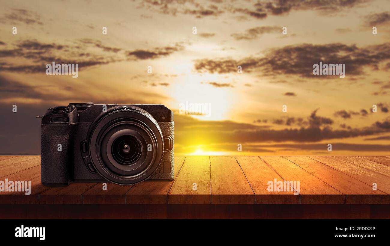 The camera with a sunset scene background. World Photography Day Stock ...