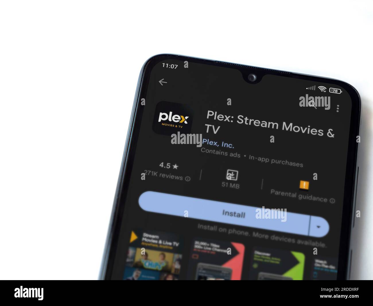 Lod, Israel - July 16,2023: Plex app play store page on smartphone on white background. Top view ...