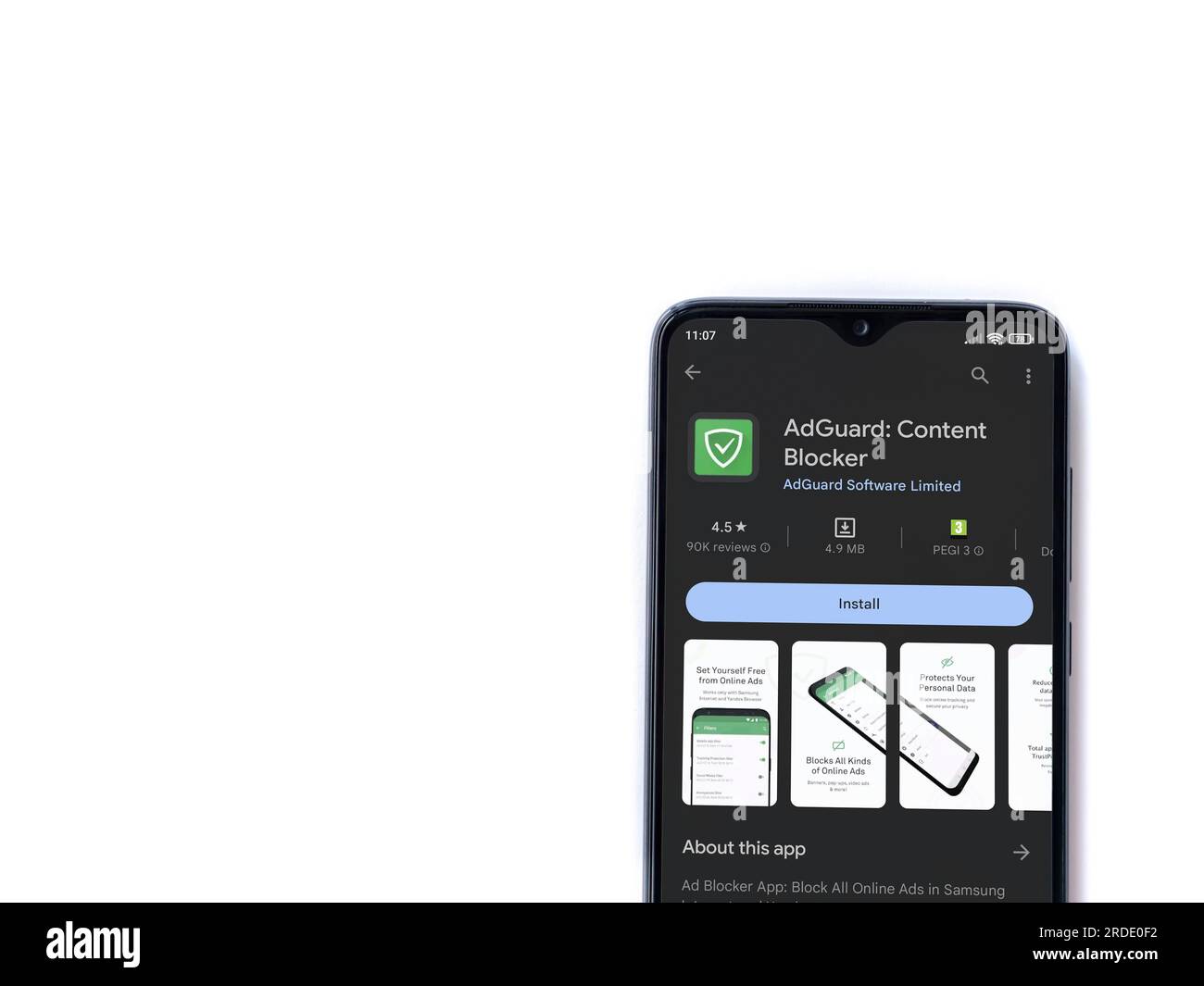 Lod, Israel - July 16,2023: AdGuard app play store page on smartphone on white background. Top ...