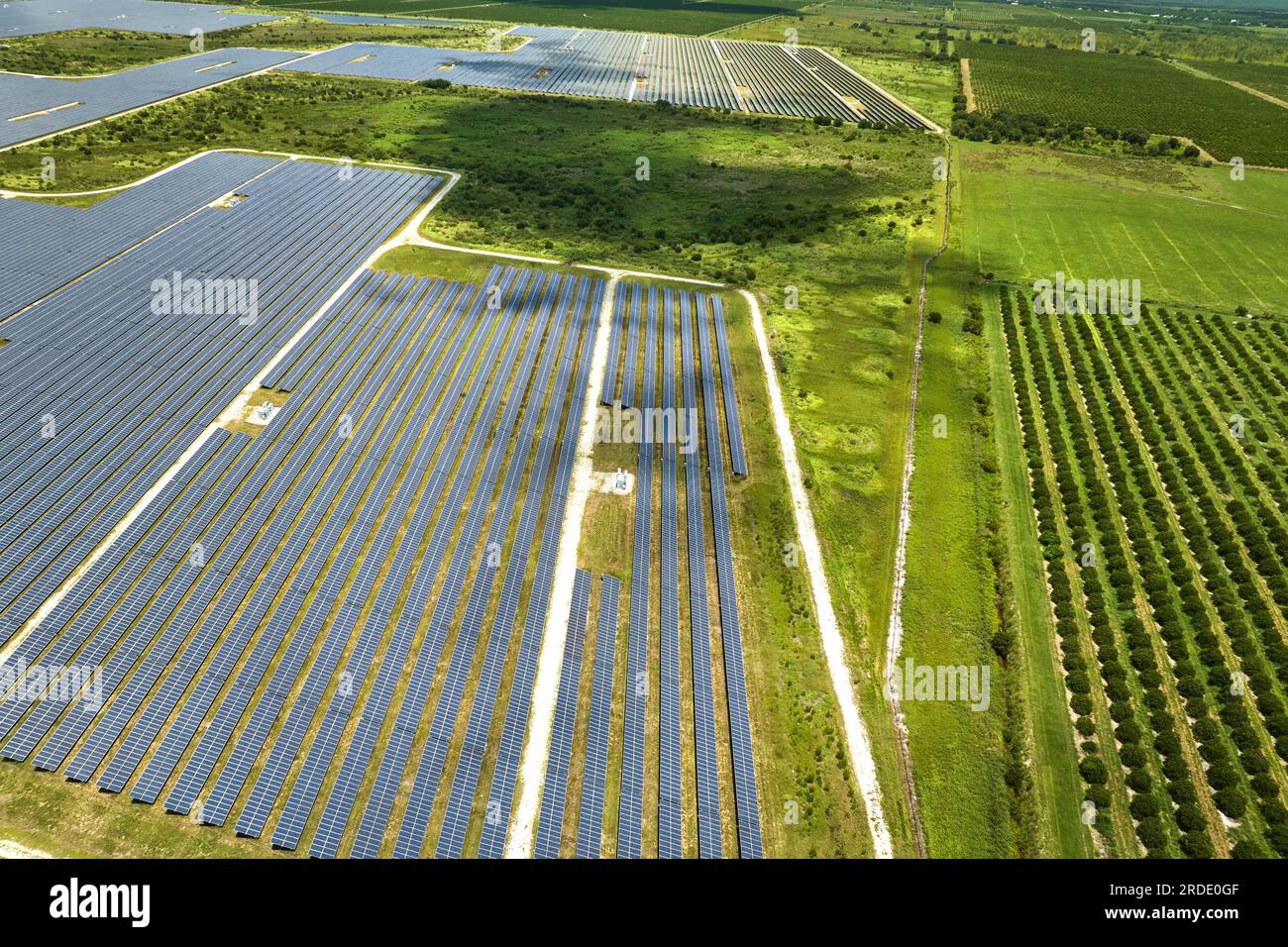 Aerial view of sustainable electric power plant between agricultural ...