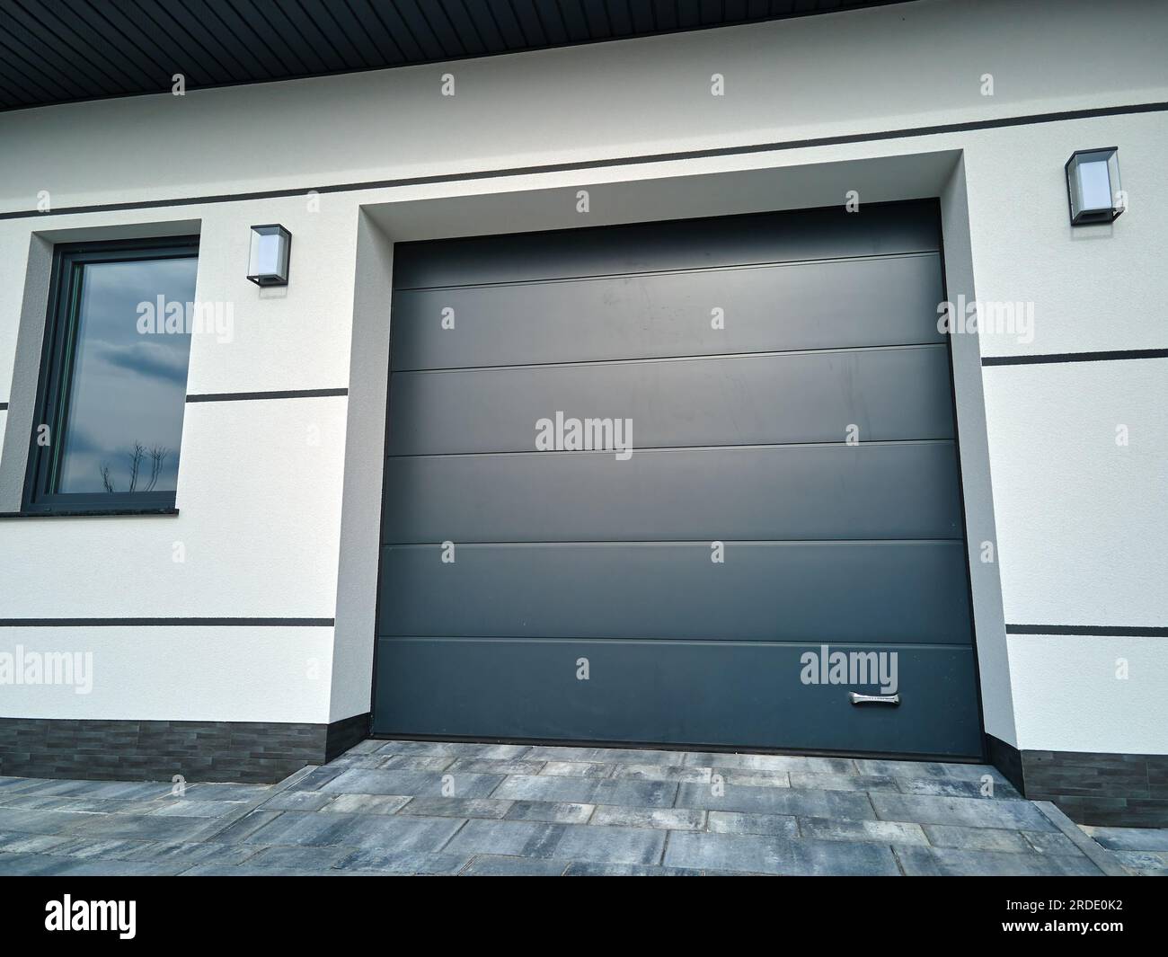 Automatic electric roll-up commercial garage gate or push-up door in ...