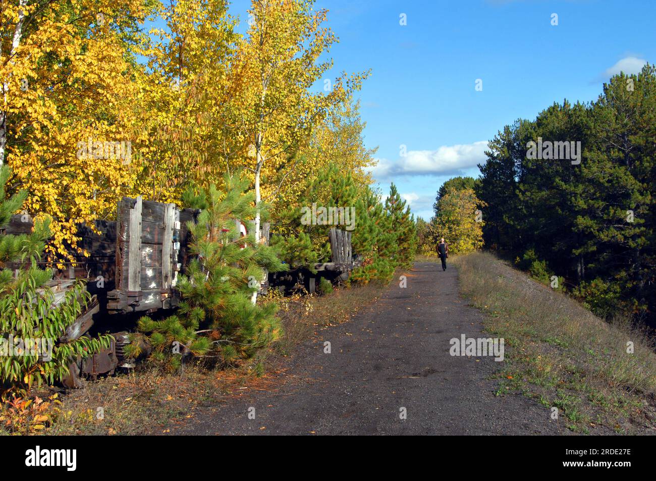 Abandoned, wooden, ore railroad cars sit above the historic Quincy ...