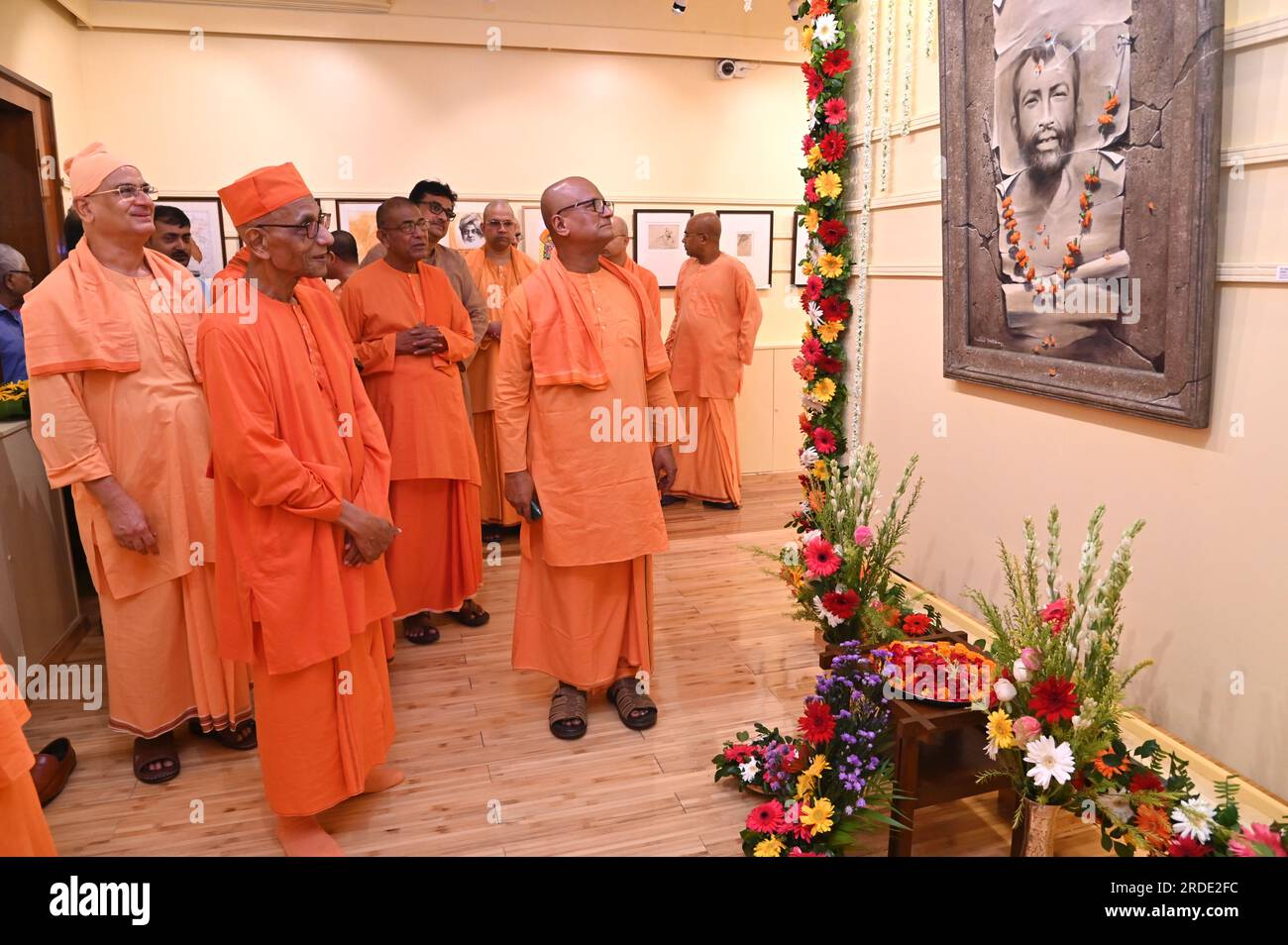 Kolkata, India. 19th July, 2023. Sadhus are seeing a portrait of Shree ...