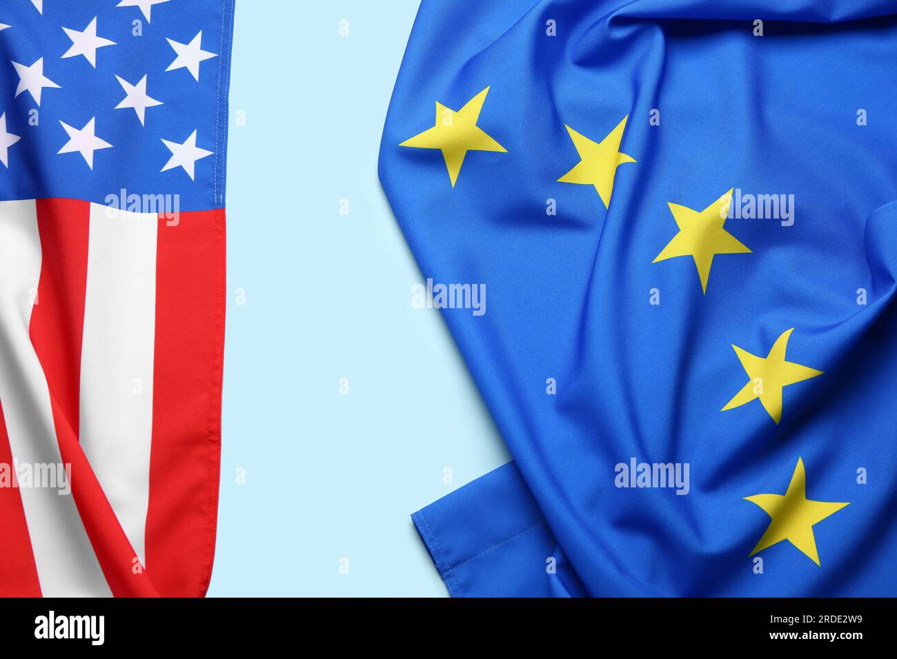 Flags of European Union and USA on blue background Stock Photo - Alamy