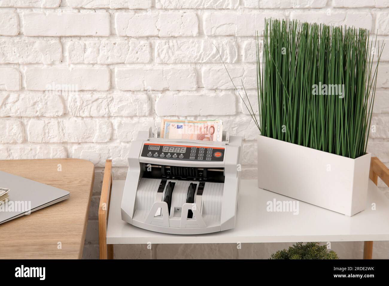 Euro bills calculating electronic counter hi-res stock photography and ...