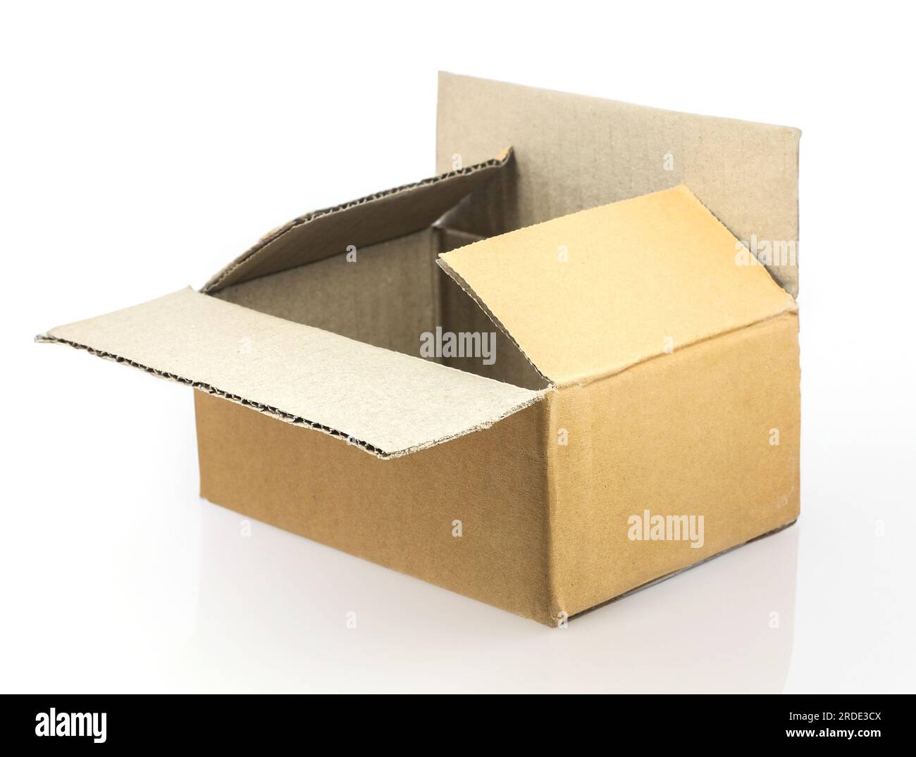 cardboard box closeup isolated on white background Stock Photo - Alamy