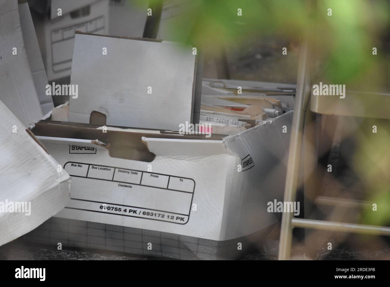 Boxes of evidence being searched and cataloged at the storage unit at ...