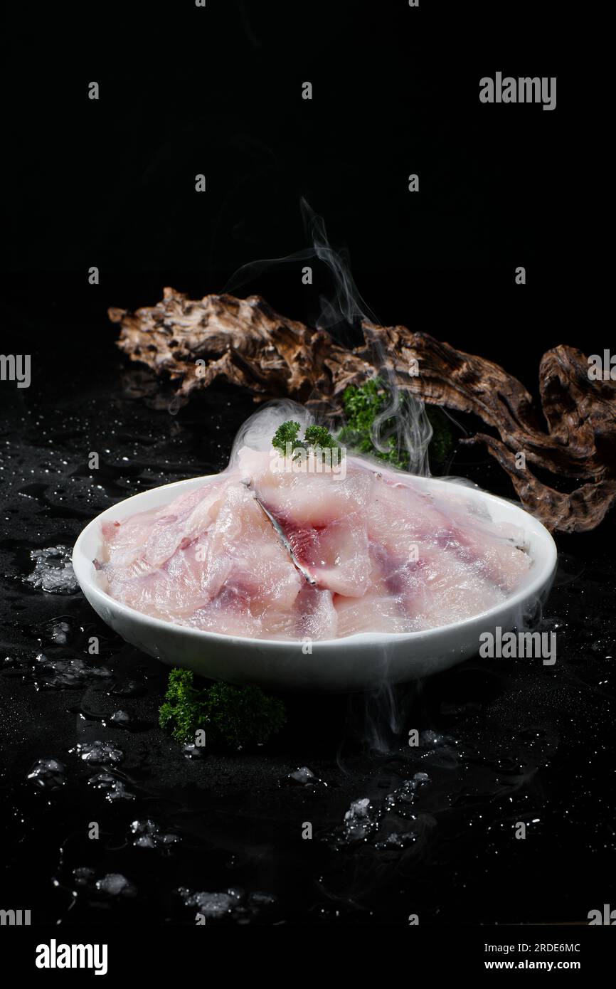fresh raw slice Fish Fillet for hot pot use Stock Photo - Alamy