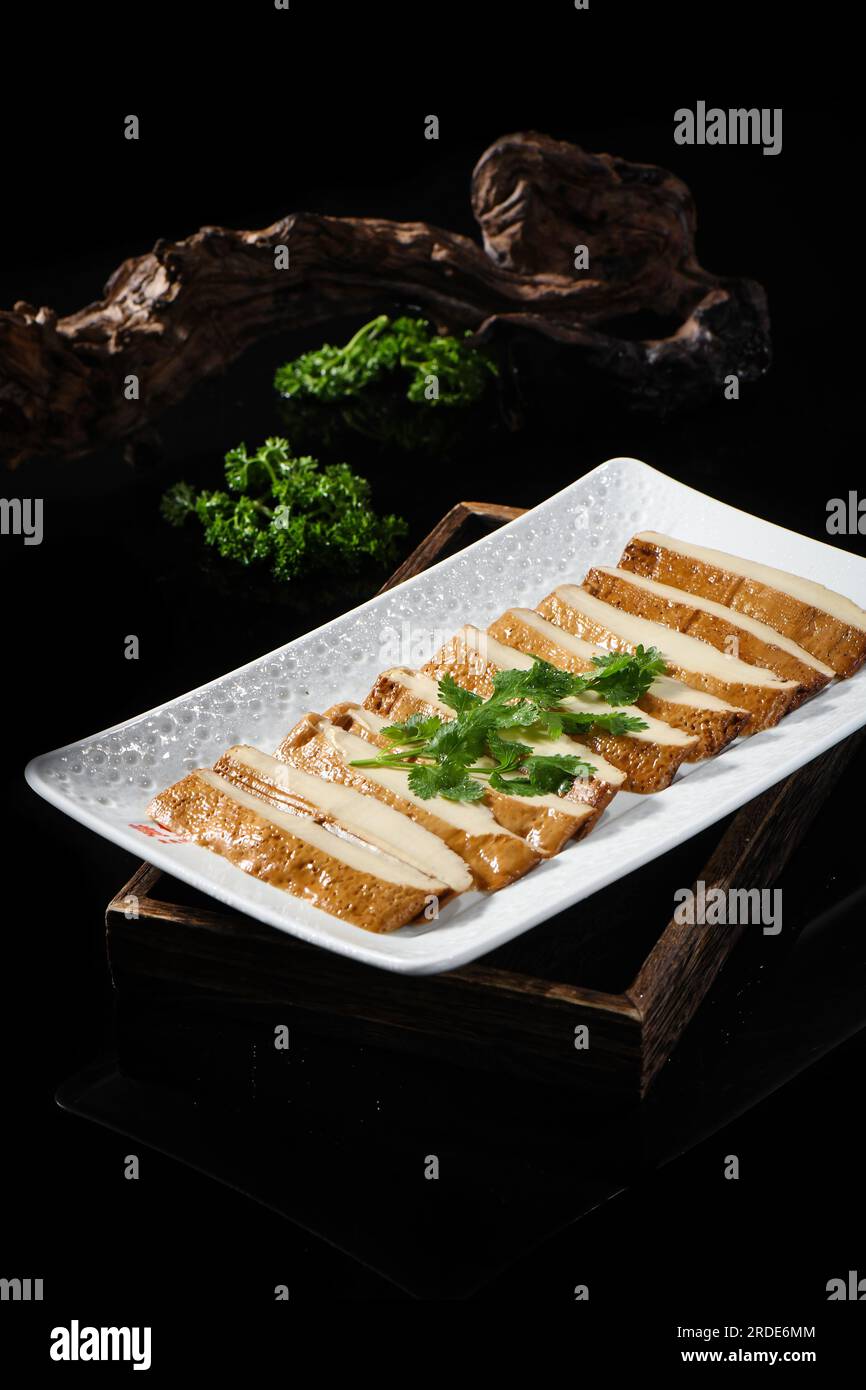 Marinated Dougan, dried tofu in Spiced Sauce Stock Photo - Alamy