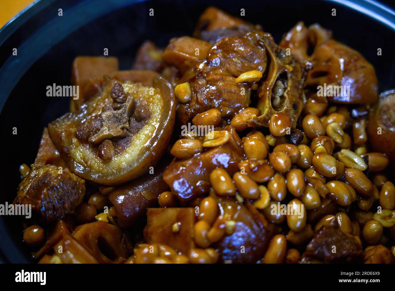 A delicious Chinese dish, Braised Pig Tail with Peanuts Stock Photo - Alamy