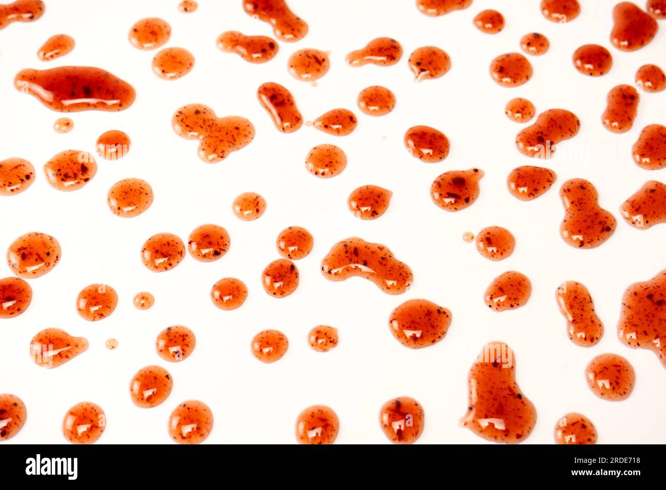 Red jam splashes isolated on a white background. Top view Stock Photo ...