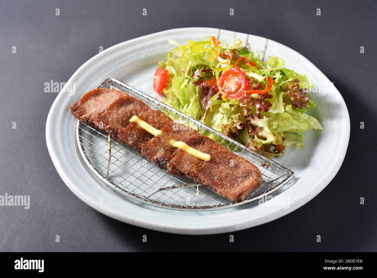Salt Grilled beef tongue,Japanese food Stock Photo - Alamy