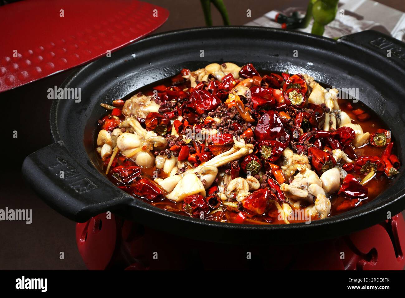 Frog with Pickled Pepper, bullfrog in sour soup Stock Photo - Alamy