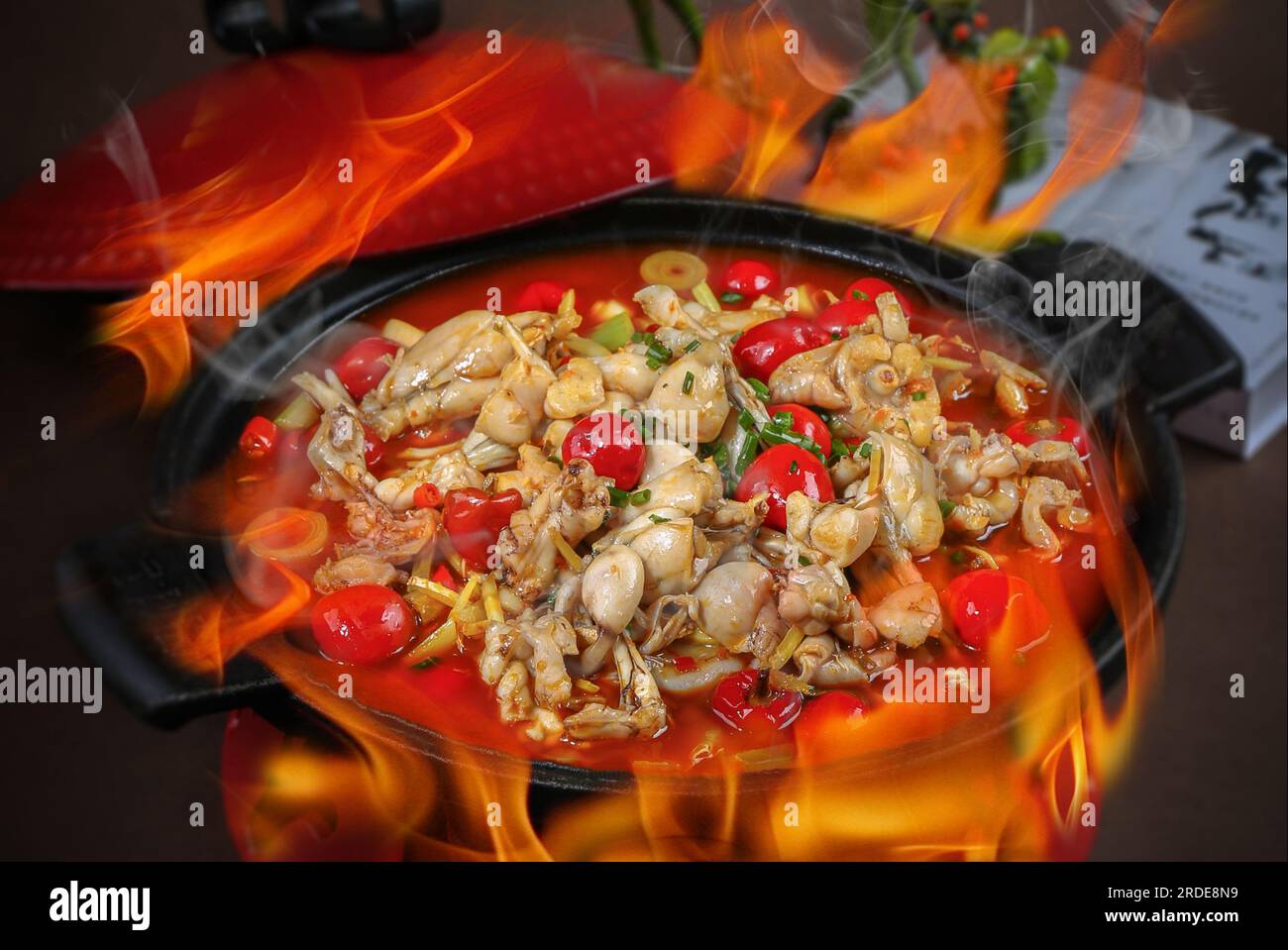 Frog with Pickled Pepper, bullfrog in sour soup Stock Photo - Alamy