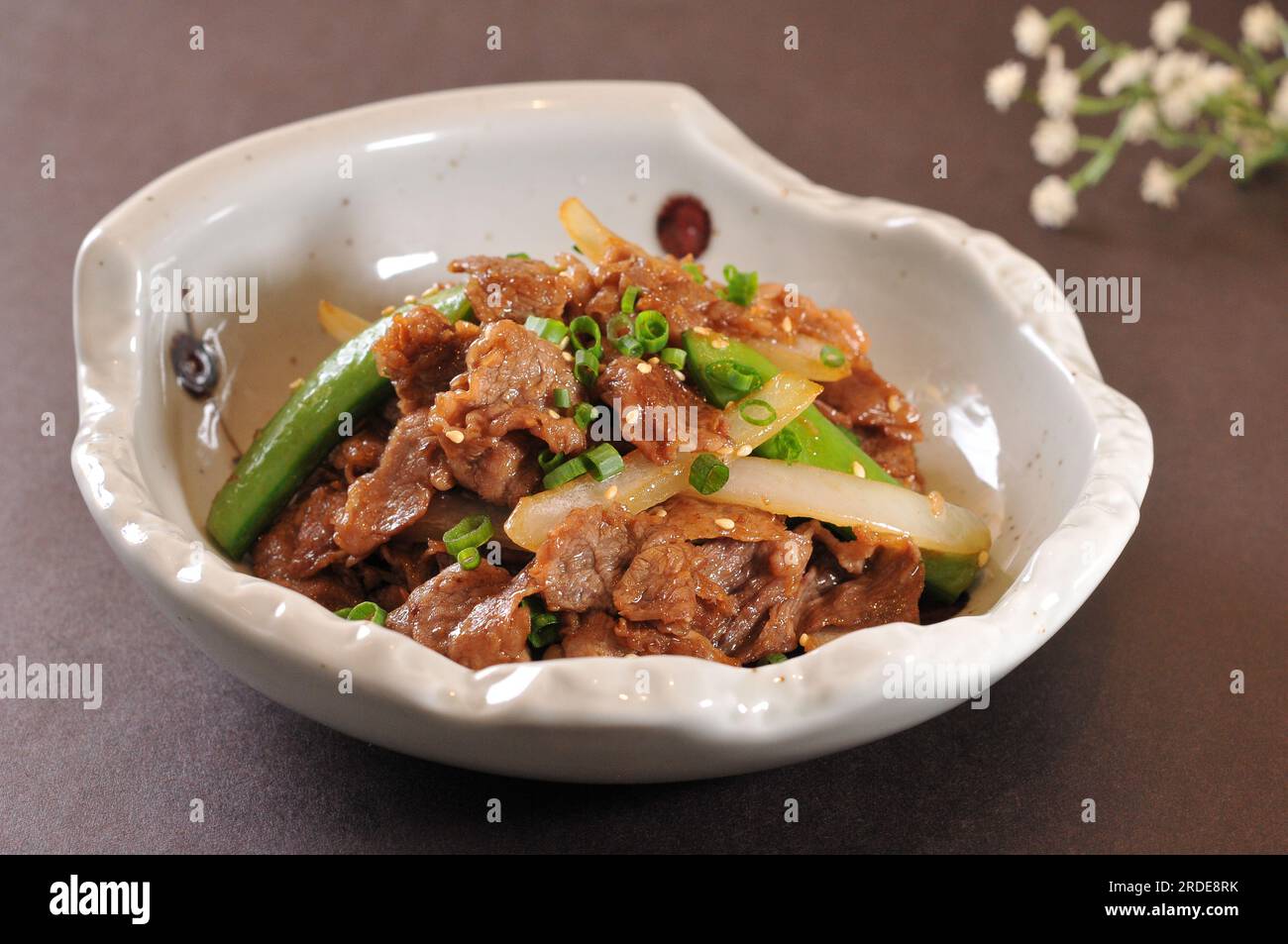 Traditional fried and stirred beef teriyaki.topping on the cooked rice ...