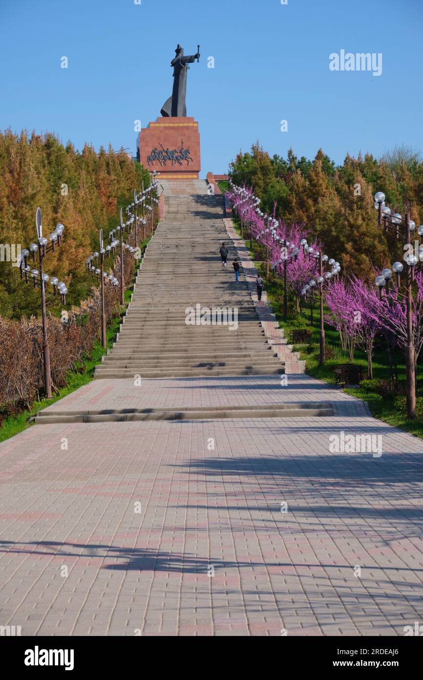 A profile view of the huge bronze statue of Baidibek Bi, in tribute to ...