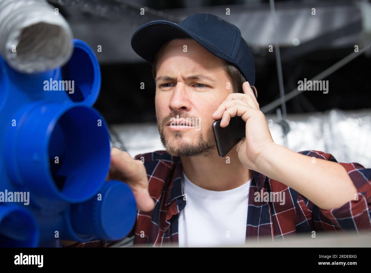 Artisan handyman phone hi-res stock photography and images - Alamy