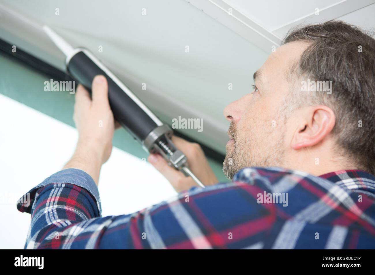 Using a sealant gun hi-res stock photography and images - Alamy