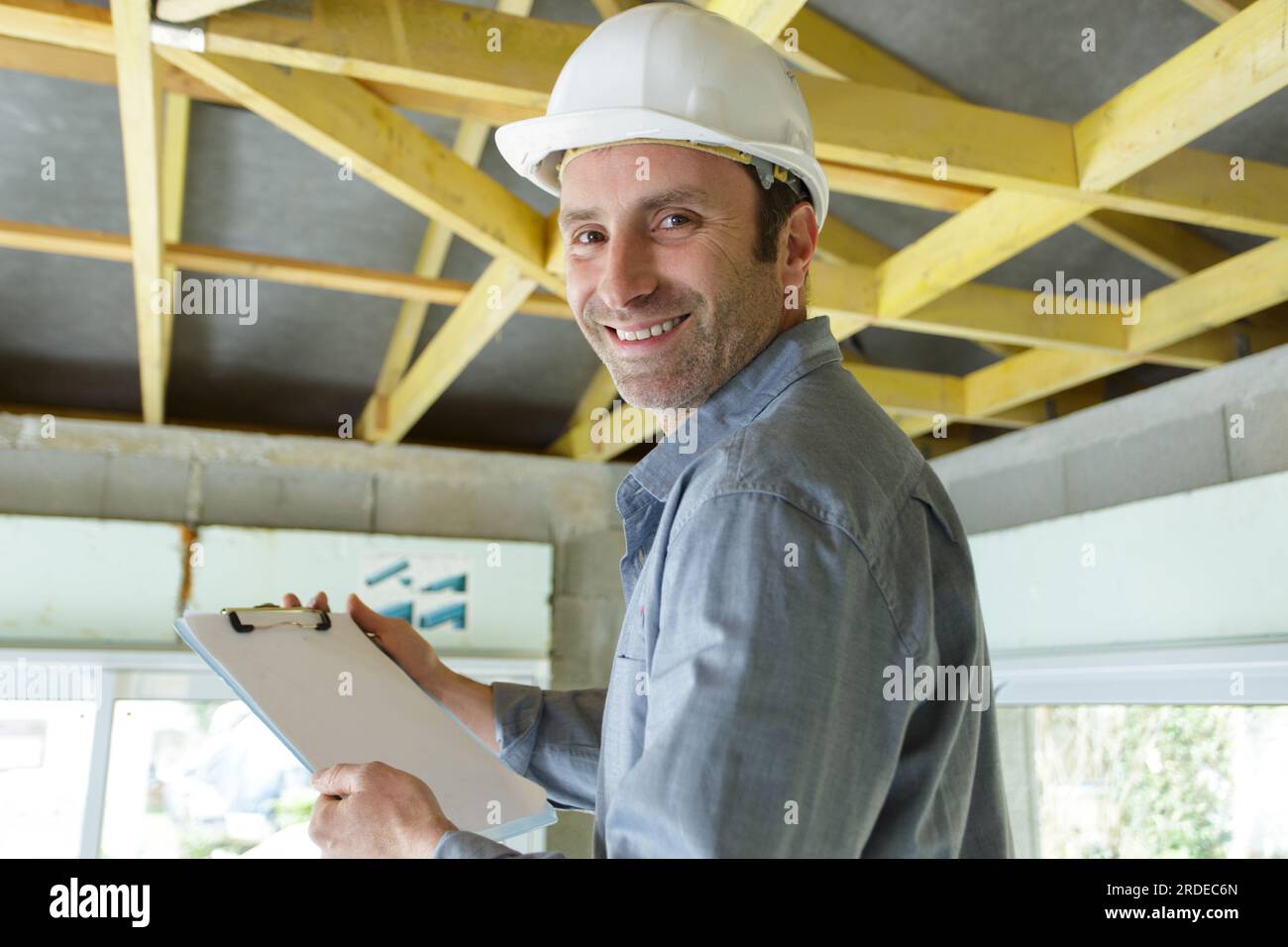 Builder in hard hat writing hi-res stock photography and images - Alamy