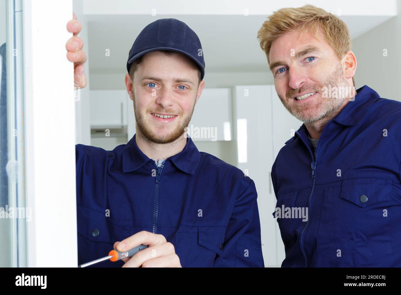 Tradesmen at door hi-res stock photography and images - Alamy