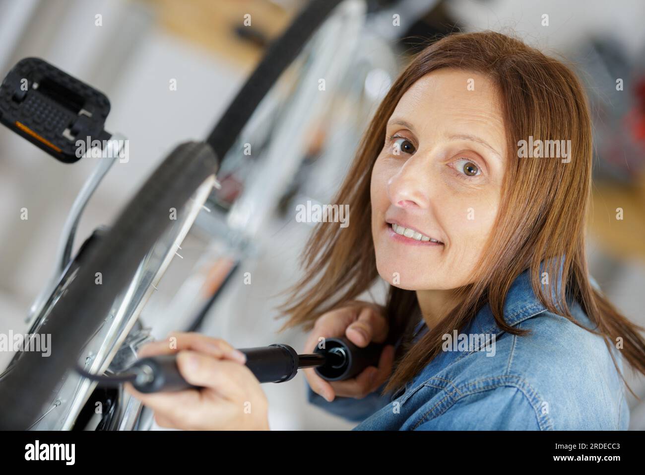 Woman assembler hi-res stock photography and images - Alamy