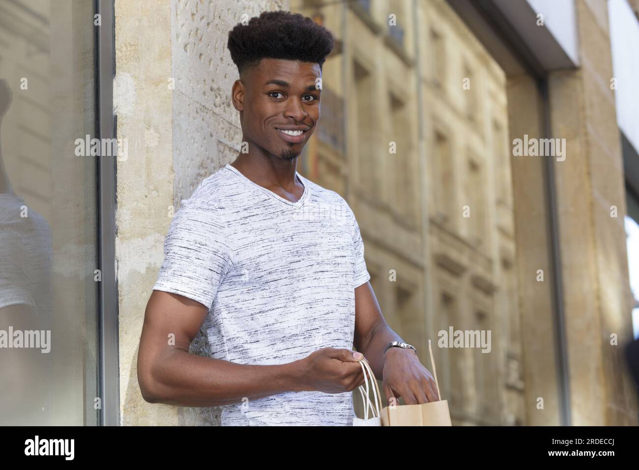 Excited attractive model shopping bags hi-res stock photography and ...