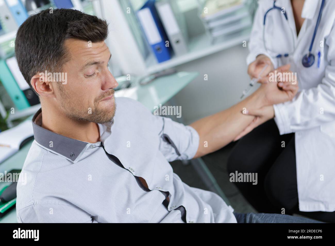 Blood test man having hi-res stock photography and images - Alamy