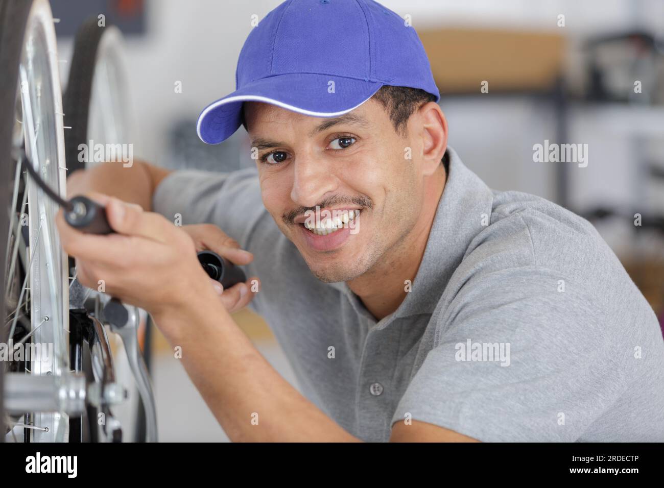 Man using air pump hi-res stock photography and images - Alamy