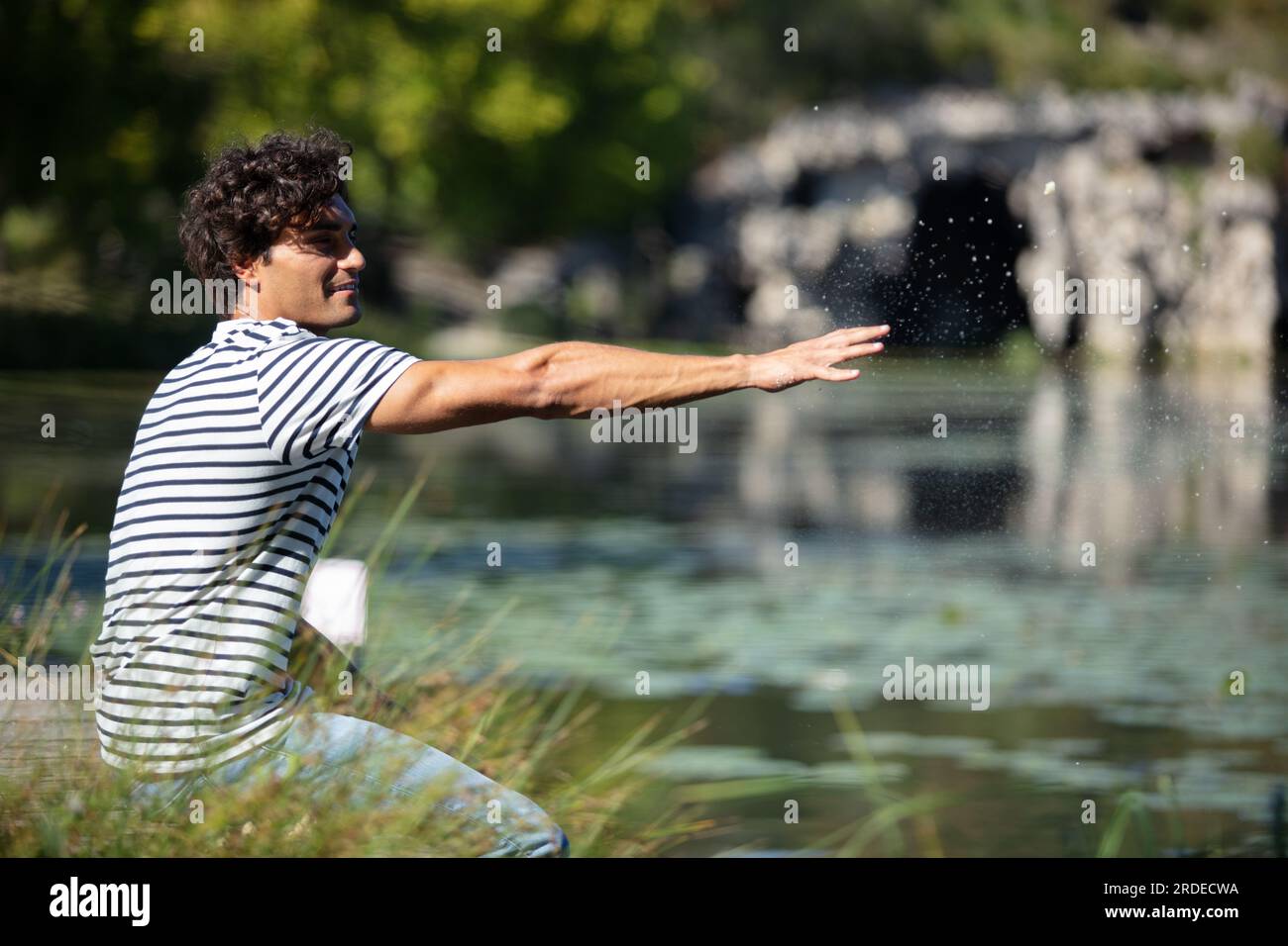 Man throwing a rock hi-res stock photography and images - Alamy