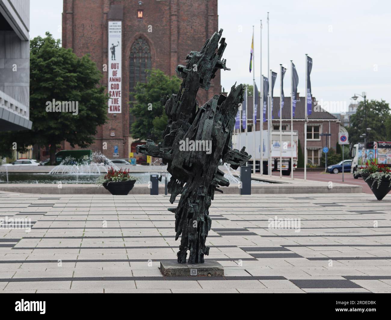 Bronze "Evolution" Sculpture by Piet Slegers in 1969. Located next to ...