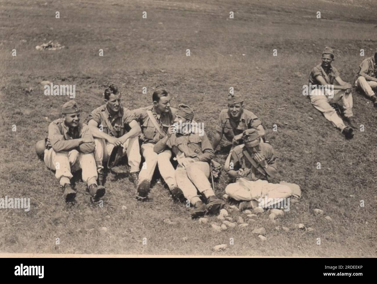 vintage military training photo, young cadets are sitting and lying on ...