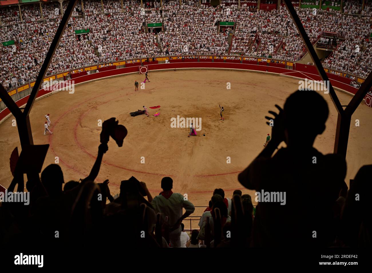 Bullfighters perform during the last bullfight of the San Fermin ...