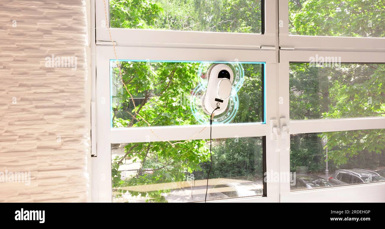 Automatic Glass Cleaner Robot. Home Washing Equipment Stock Photo - Alamy