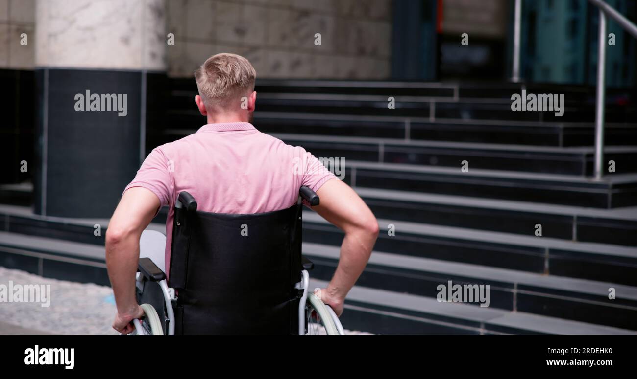Paralyzed Man With Disability Stair Access Problem Stock Photo - Alamy