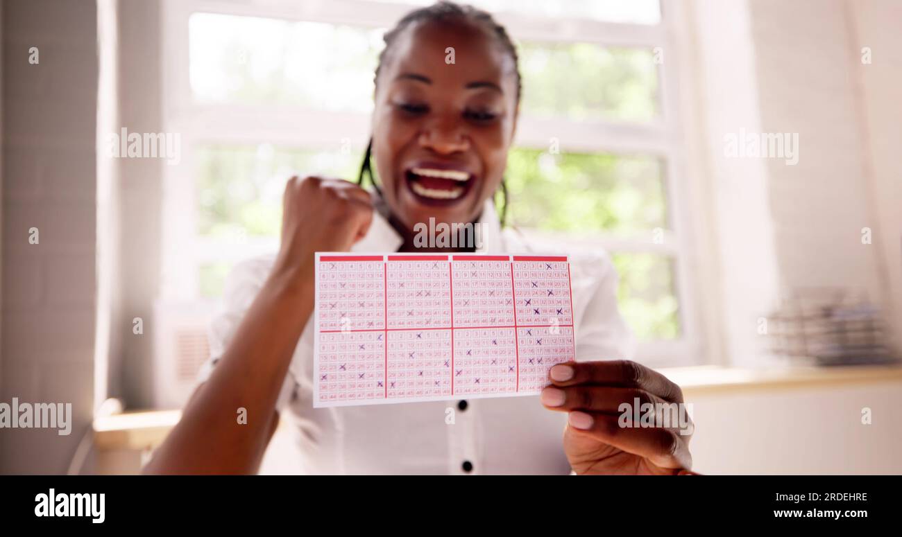 African Woman Kissing Gamble Ticket. Lotto Game Card Stock Photo - Alamy