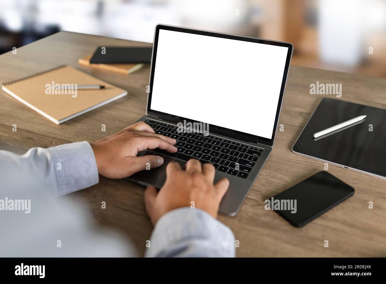 men using laptop computer working at office workspace with blank ...