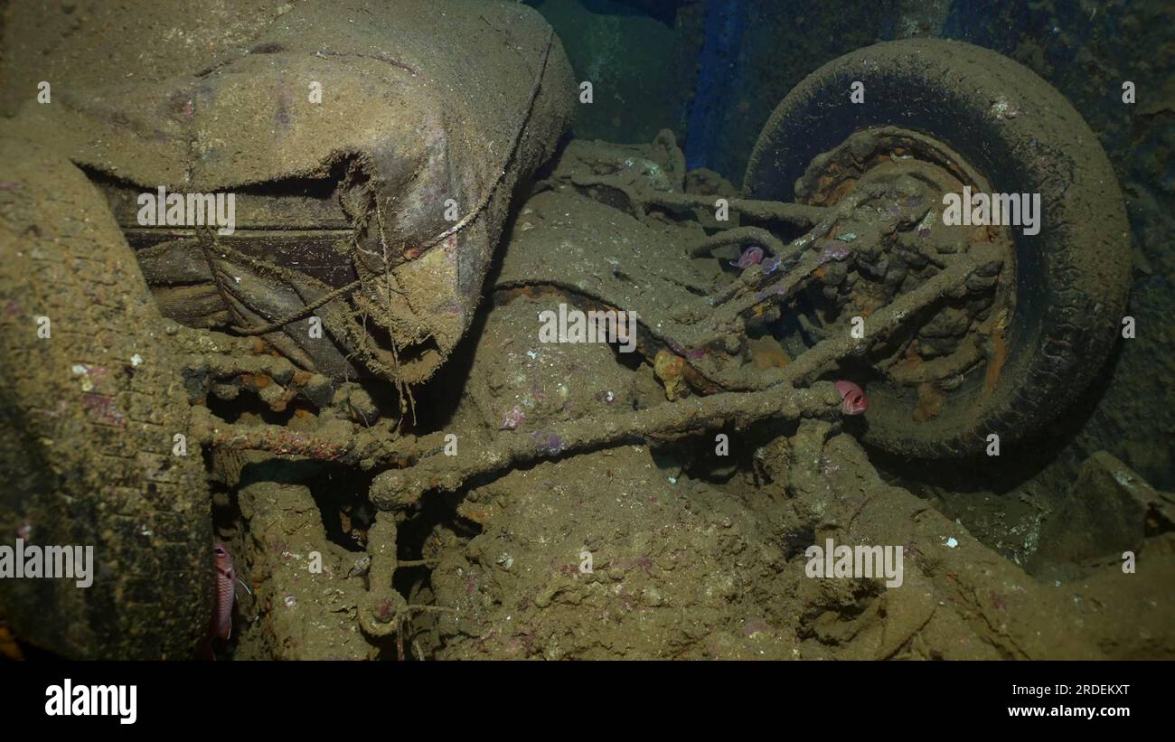 Overturned car and other cargo inside hold of ferry Salem Express ...