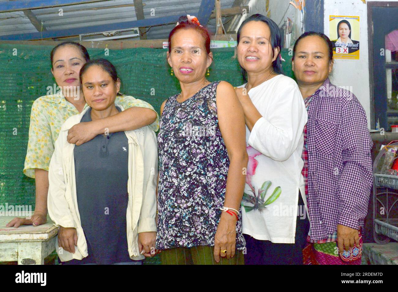 Five Thai sisters pose for a photo in a tiny rural farming hamlet in ...