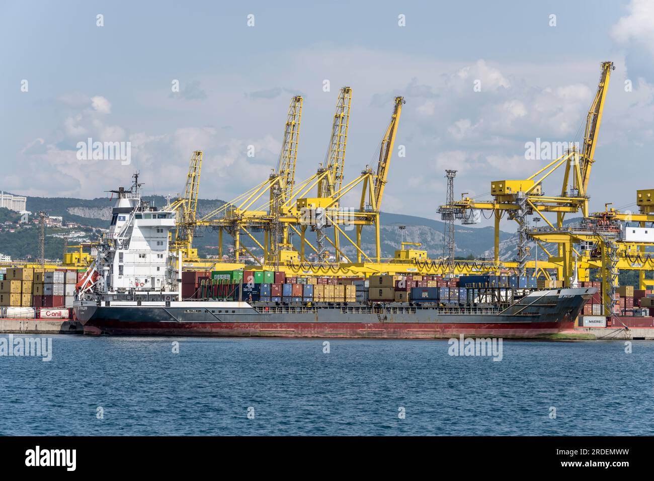 TRIESTE, ITALY - may 29 2023: cityscape with cargo ship and large ...