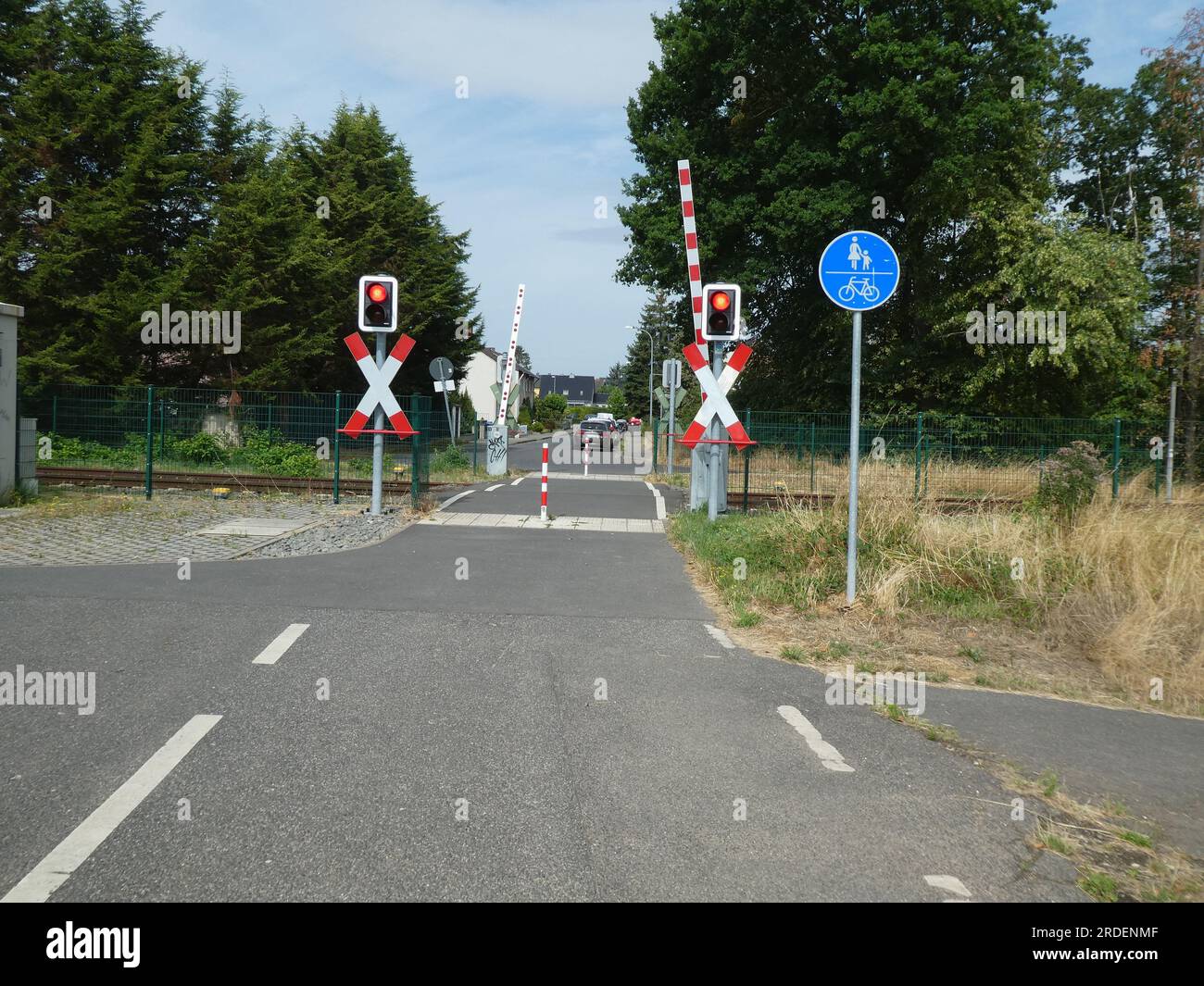 Weilerswist, Germany. 18th July, 2023. closing barrier for pedestrians ...
