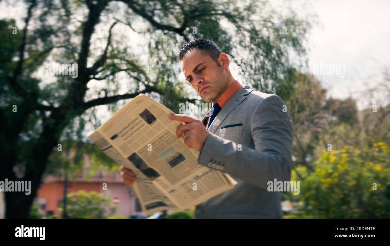 Business Man Read The Newspaper Stock Photo - Alamy