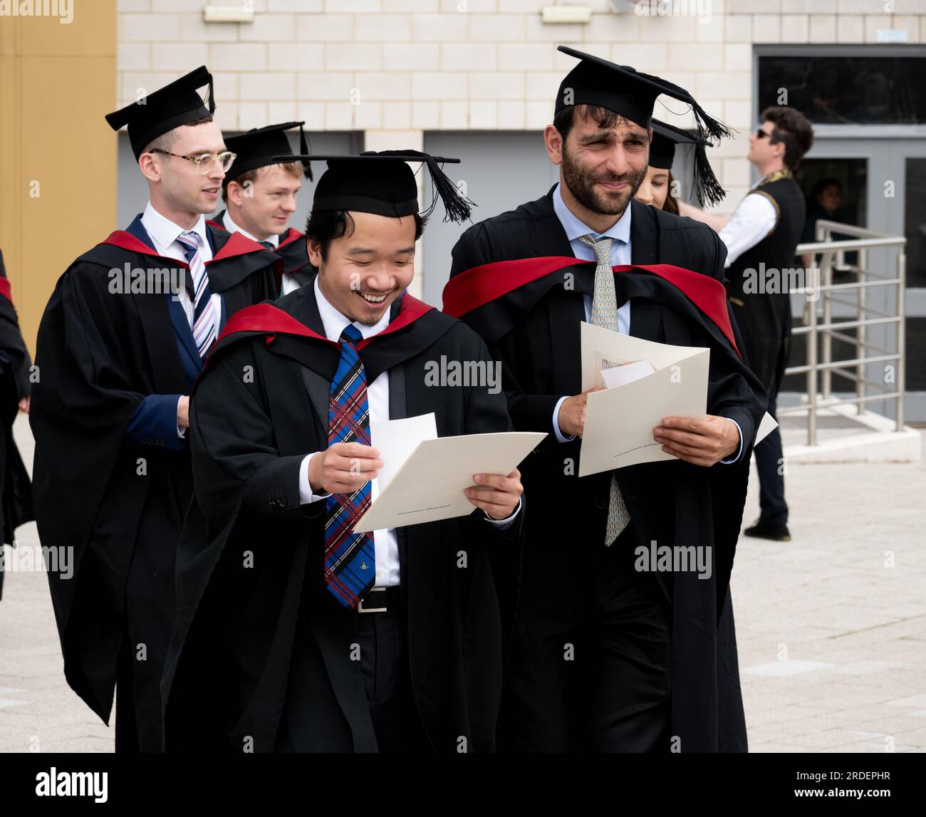 University students wearing graduation hi-res stock photography and ...