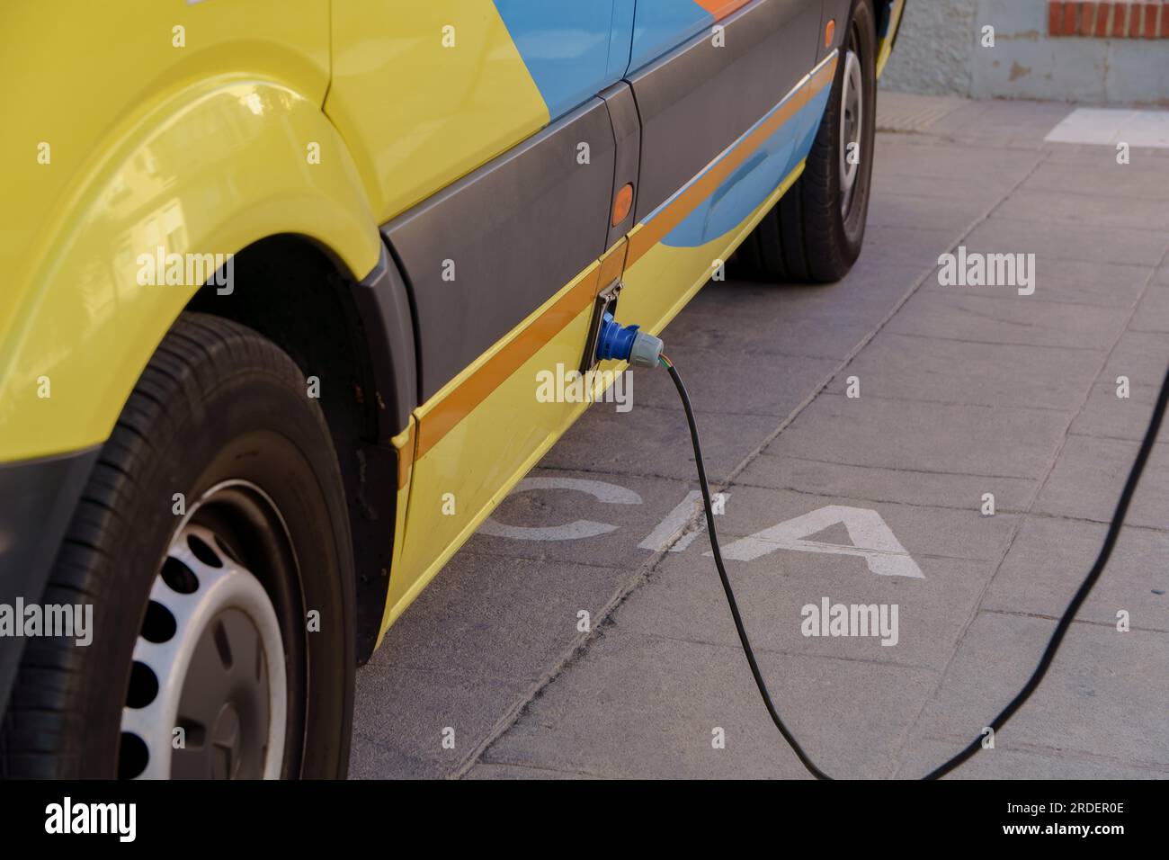 Charging cable to an outlet on an ambulance to charge the electrical ...