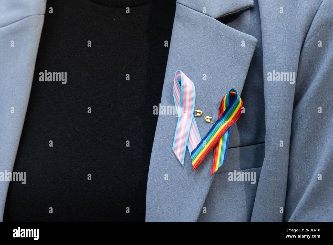 Berlin, Germany. 20th July, 2023. One person wears ribbons in the ...