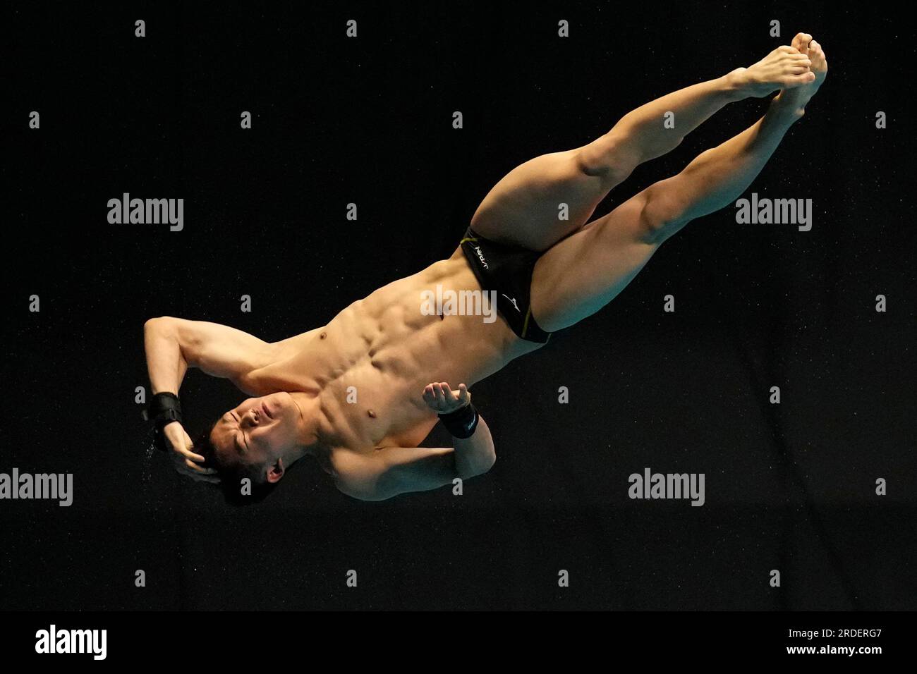 Rikuto Tamai, of Japan competes during the men's 10m platform diving ...
