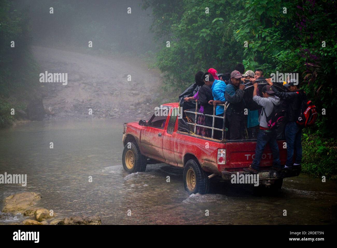 All terrain crossing a tributary of the Negro River, road to Lancetillo ...