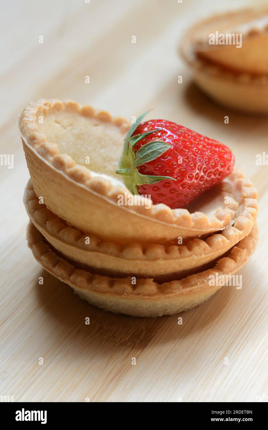 Tartelette, pre-made tartlet base with strawberry Stock Photo - Alamy