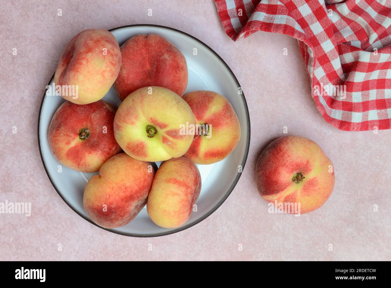 Peach, flat peaches in peel Stock Photo - Alamy
