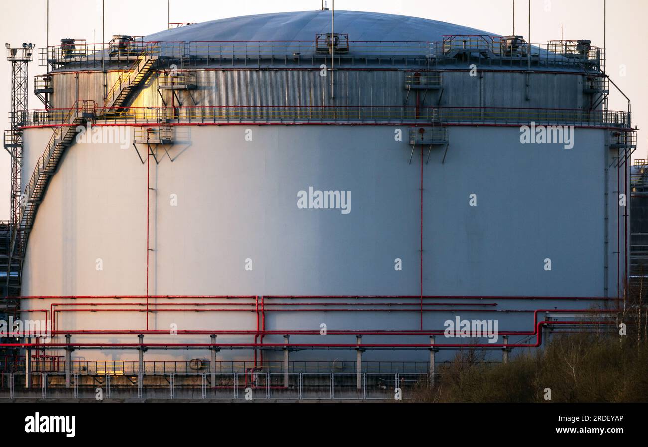 An oil tank is on the coast of industrial port, close up photo Stock ...