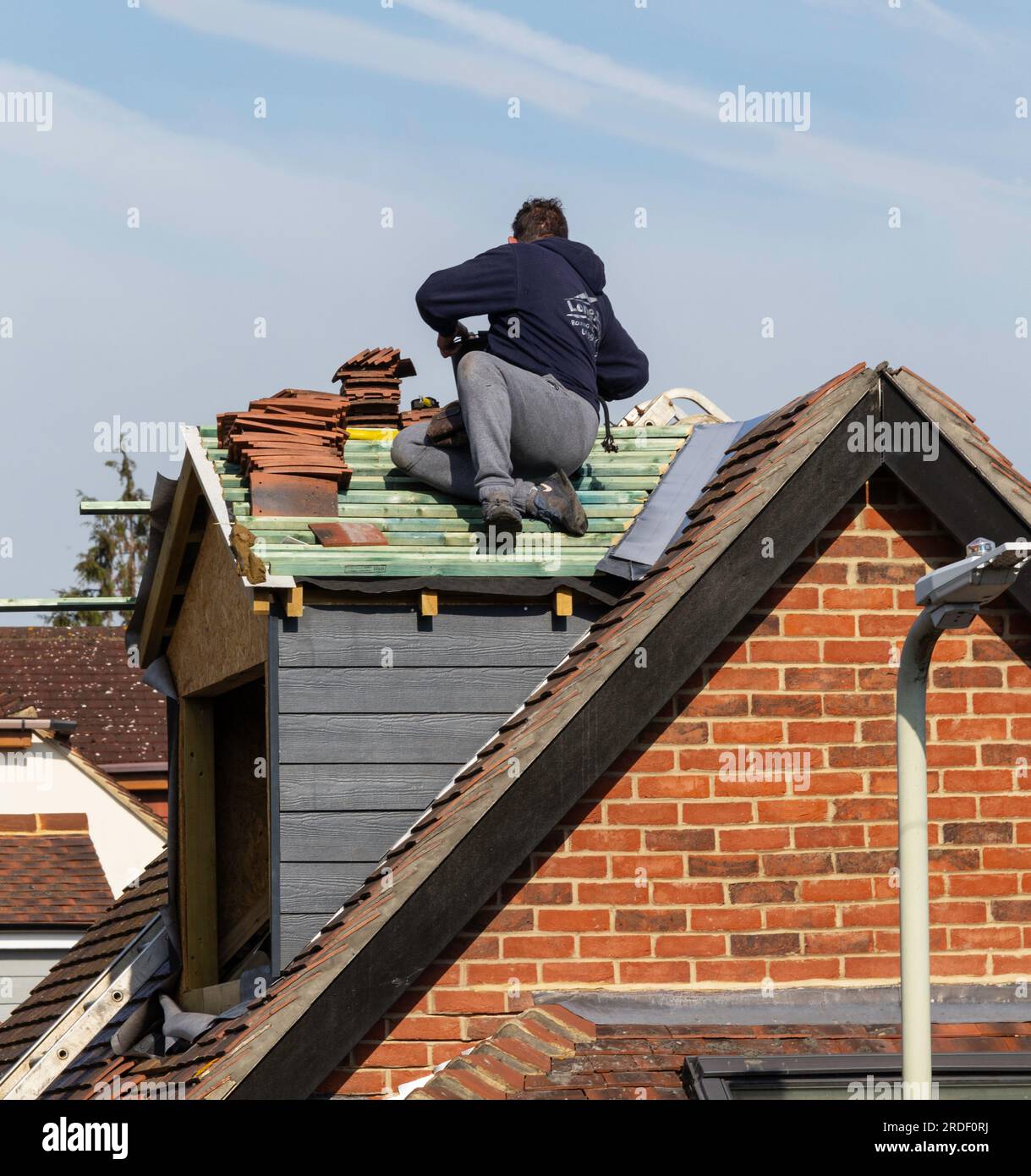 Roofing construction repairing roof hi-res stock photography and images - Alamy